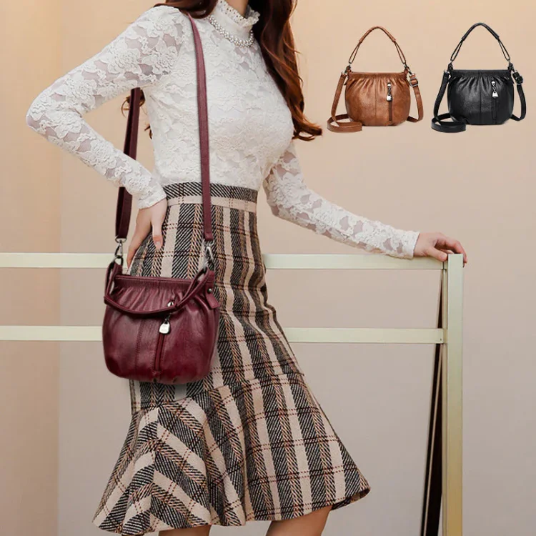 Sac à main en cuir souple à seau plissé simple et décontracté à la mod ...